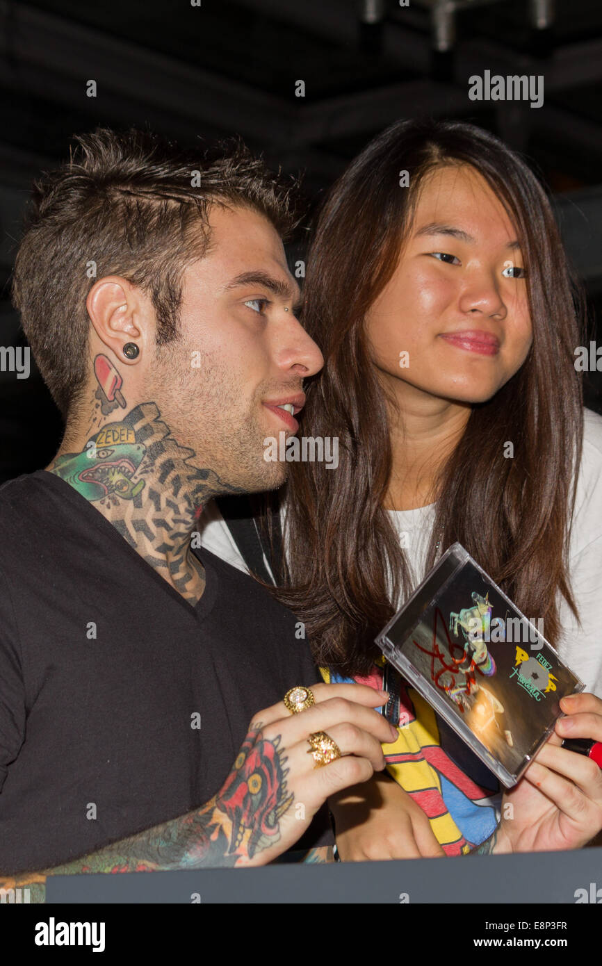 Turin, Italy. 12th October, 2014. The Italian rapper Fedez, meet his ...