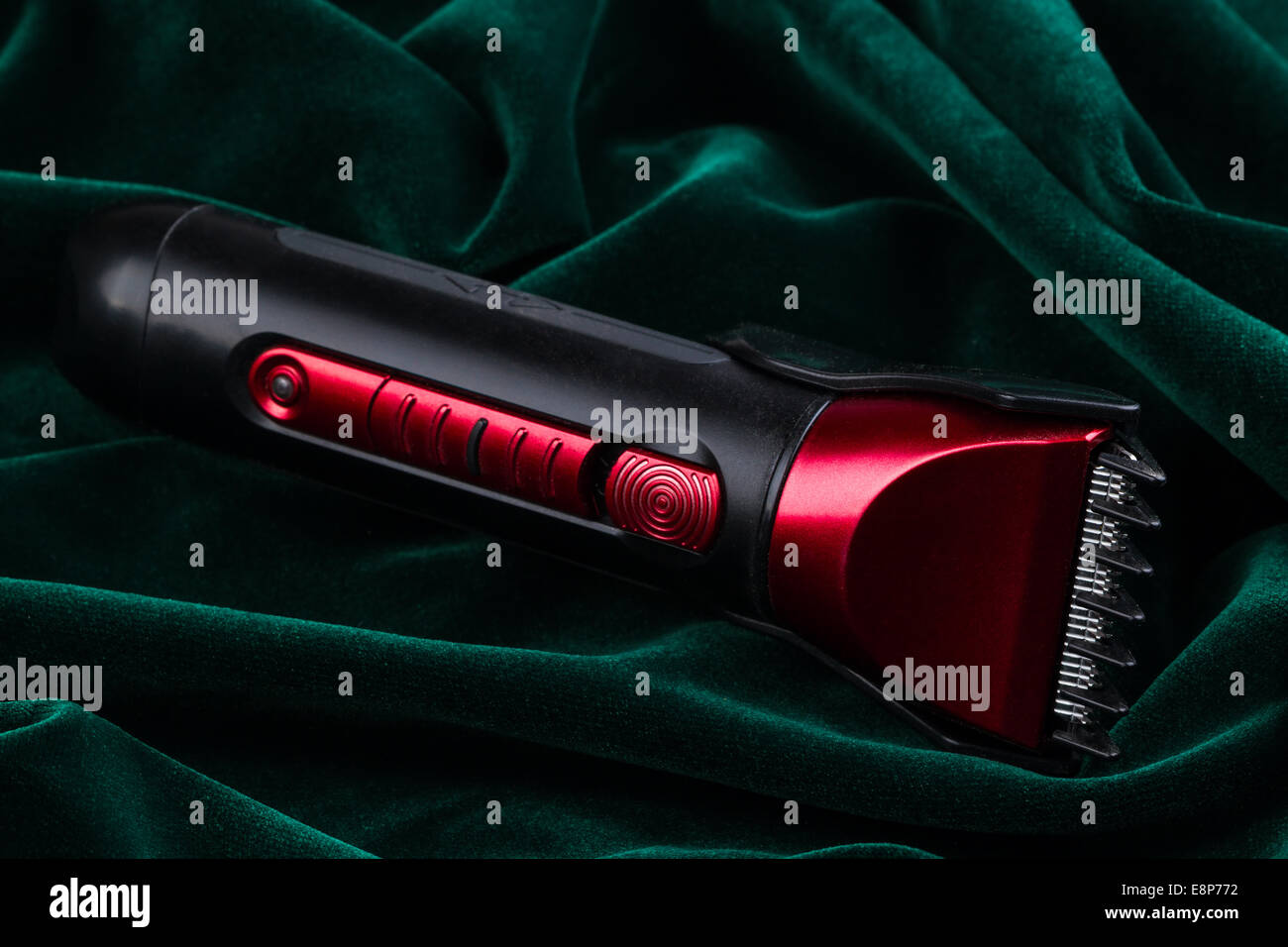 hair clipper on green background Stock Photo - Alamy