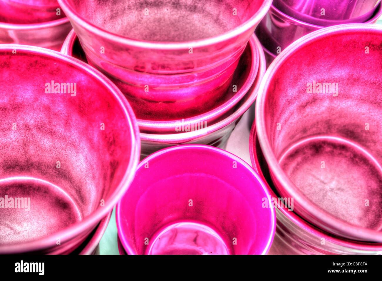 Stack of colorful pottery garden pots Stock Photo - Alamy