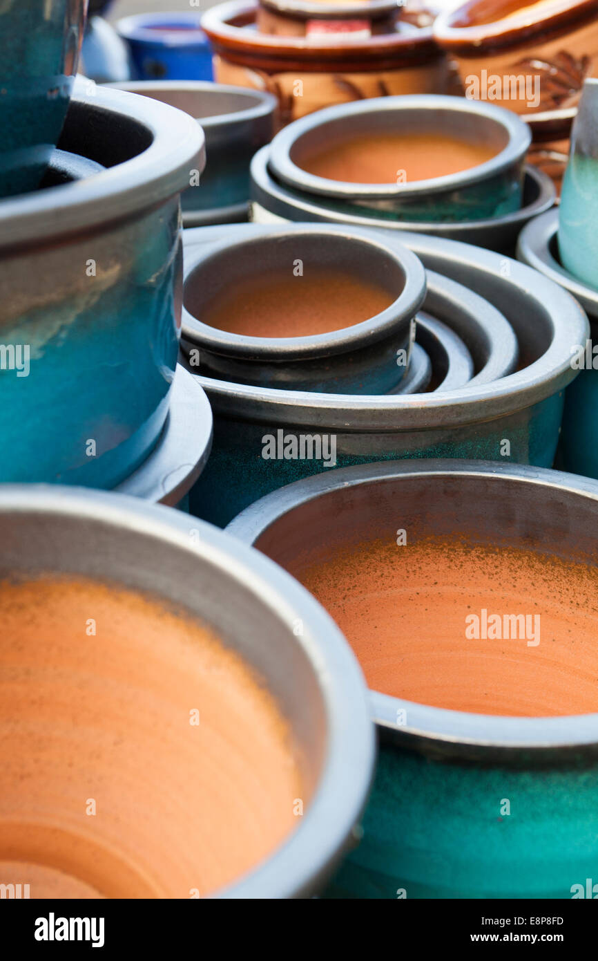 Stack of colorful pottery garden pots Stock Photo - Alamy