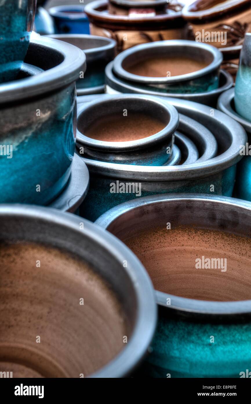 Stack of colorful pottery garden pots Stock Photo - Alamy
