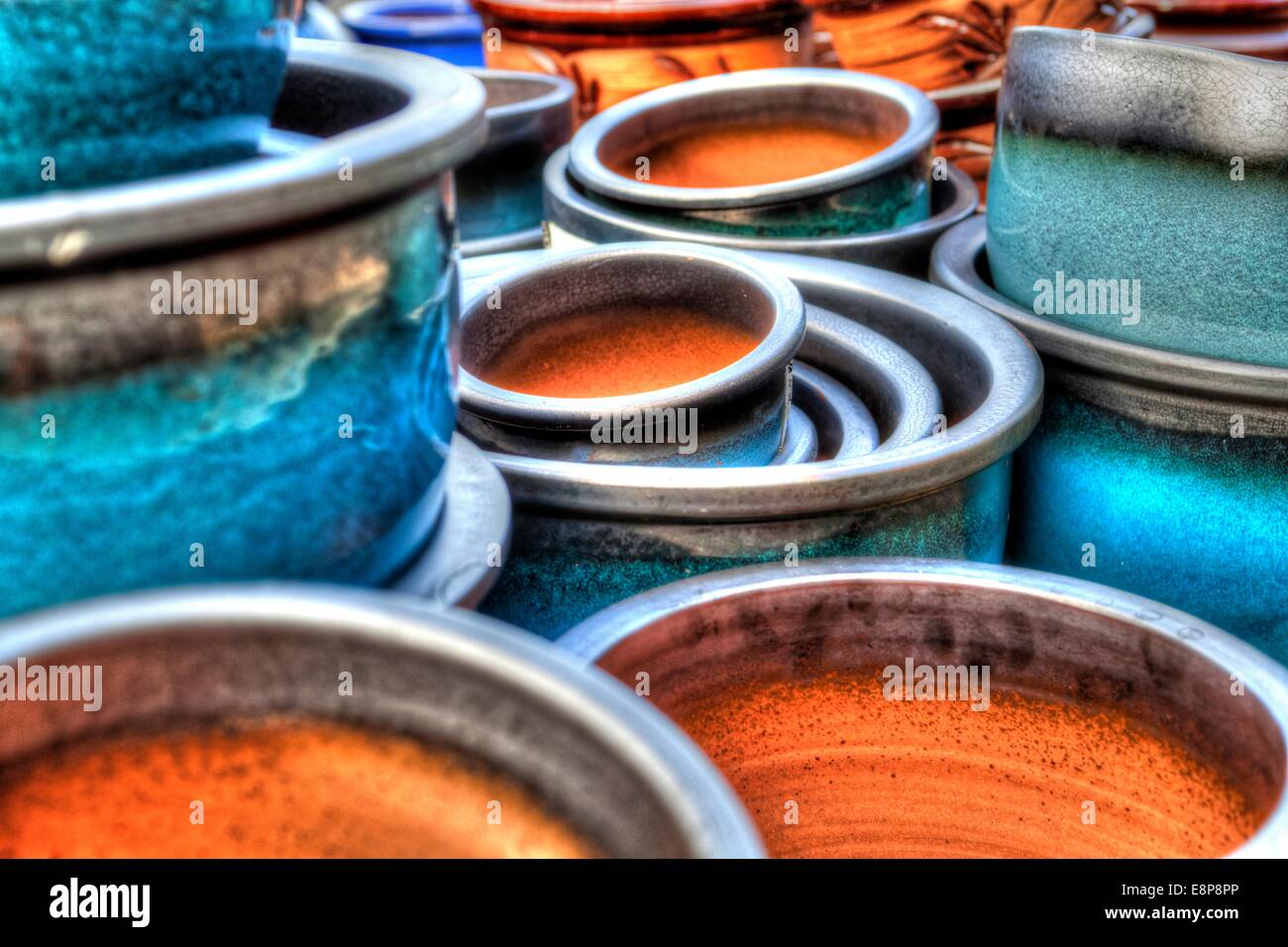 Stack of colorful pottery garden pots Stock Photo - Alamy