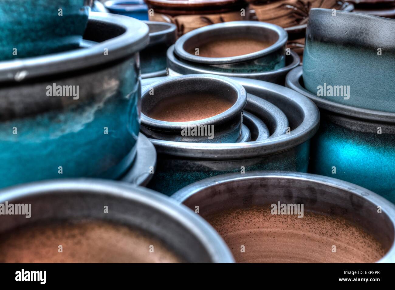 Stack of colorful pottery garden pots Stock Photo - Alamy