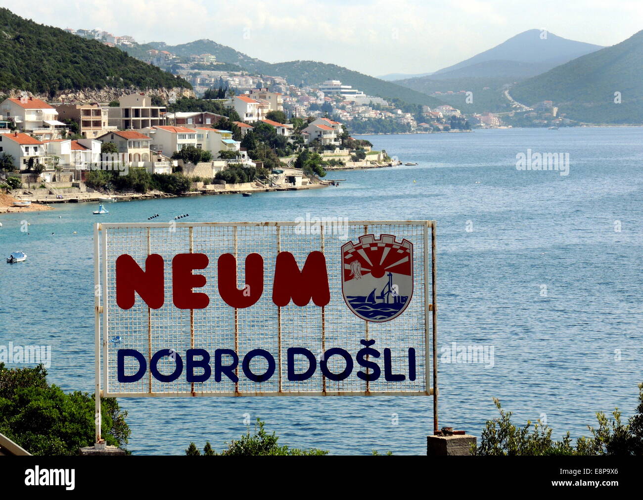 "Neum -Dobrodosli" (Welcome in Neum), in front of the setting of the ...