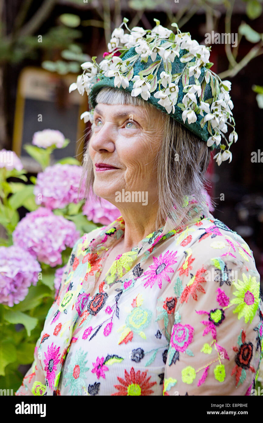 Woman flower hat hi-res stock photography and images - Alamy