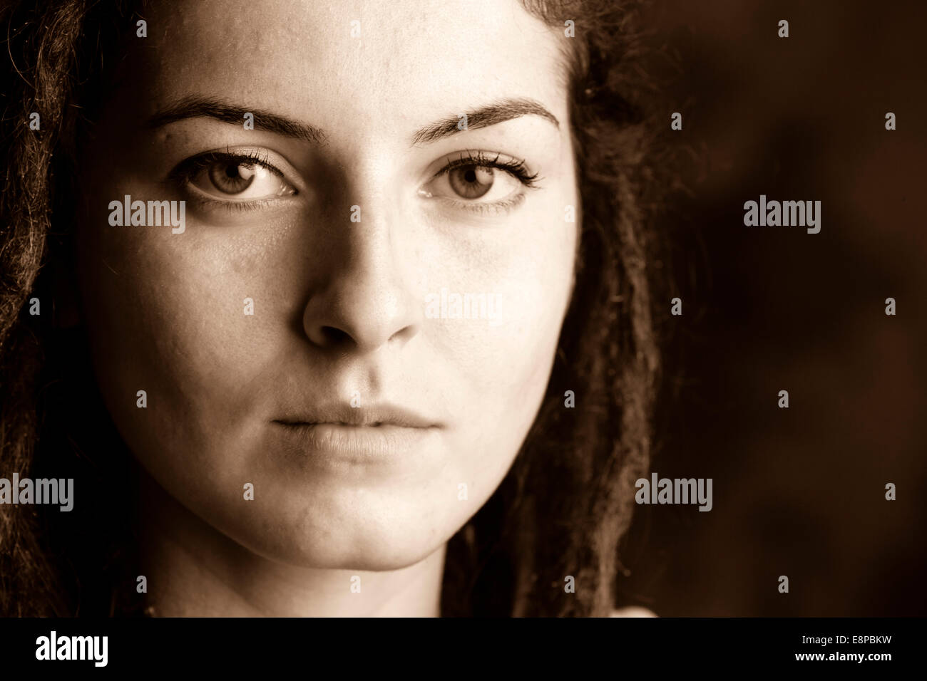 Portrait of young woman with dreadlocks Stock Photo - Alamy