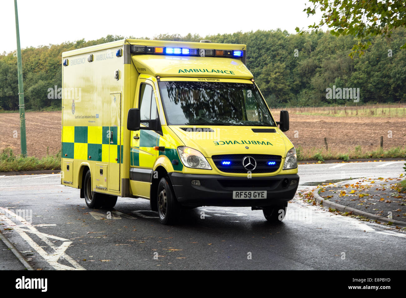 Ambulance on emergency call Stock Photo - Alamy