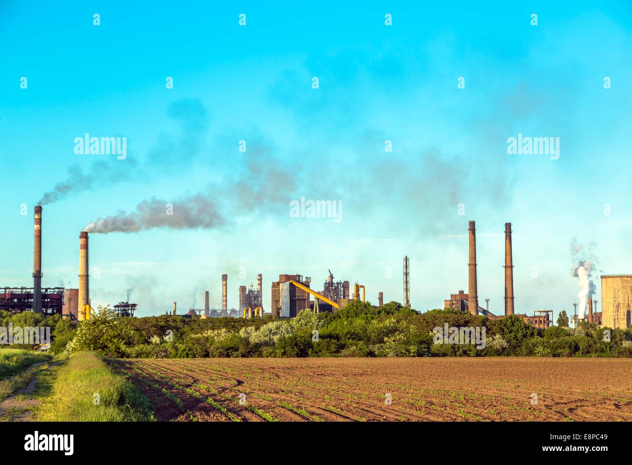 Rural landscape with factory Stock Photo - Alamy