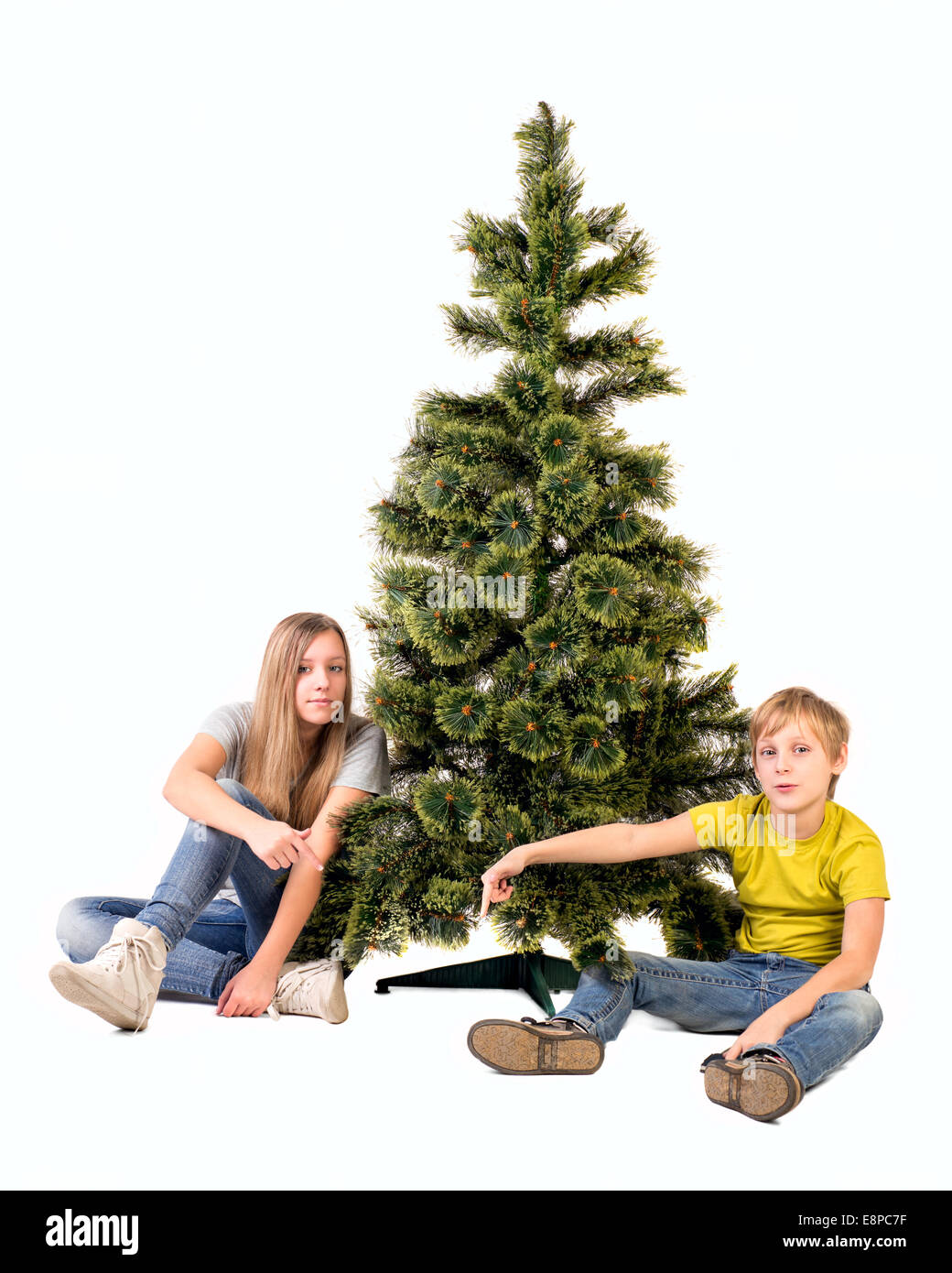 Boy sitting under tree Cut Out Stock Images & Pictures - Alamy