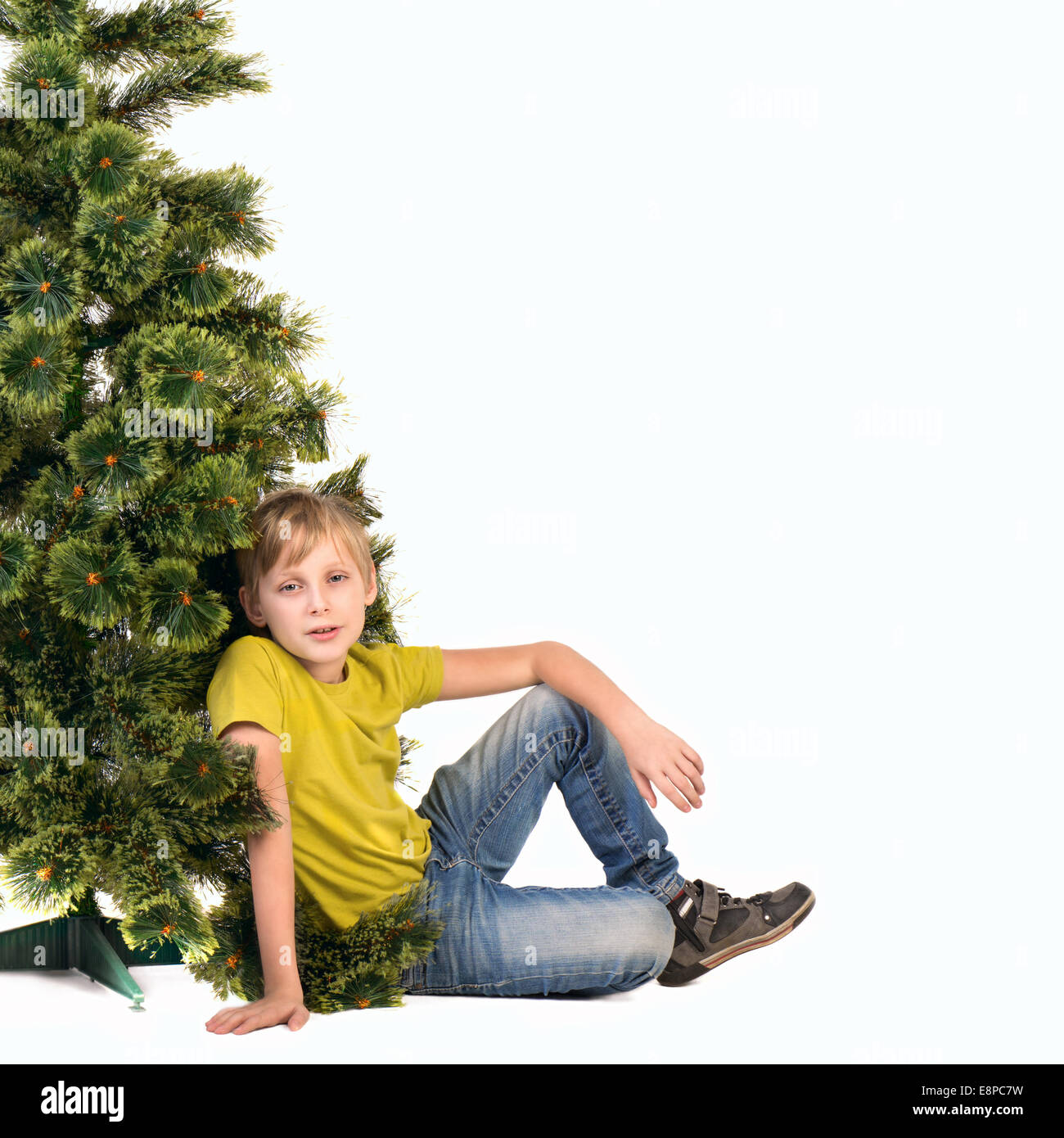 Children sit under tree hi-res stock photography and images - Alamy