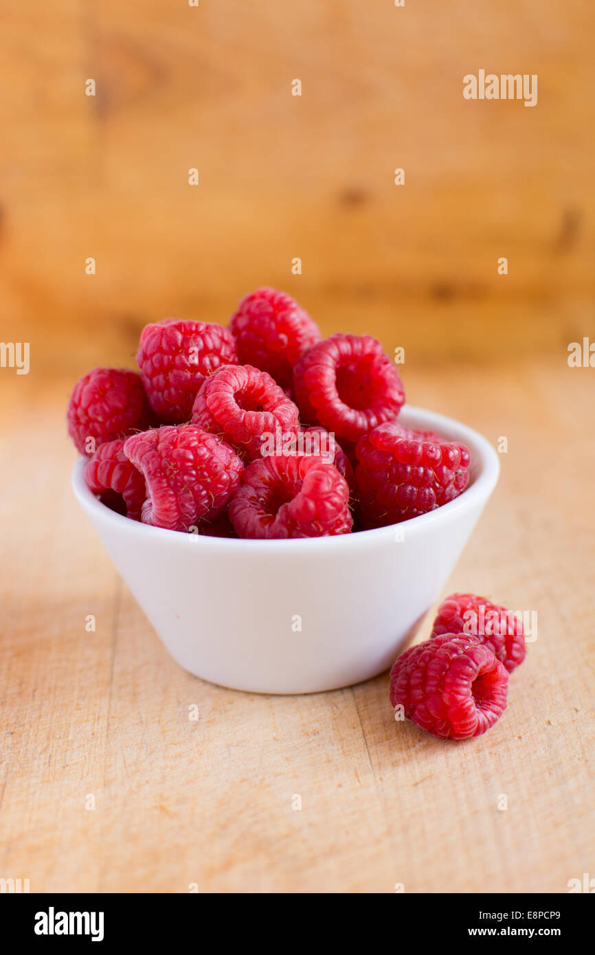 Fresh raspberry in bowl hi-res stock photography and images - Alamy
