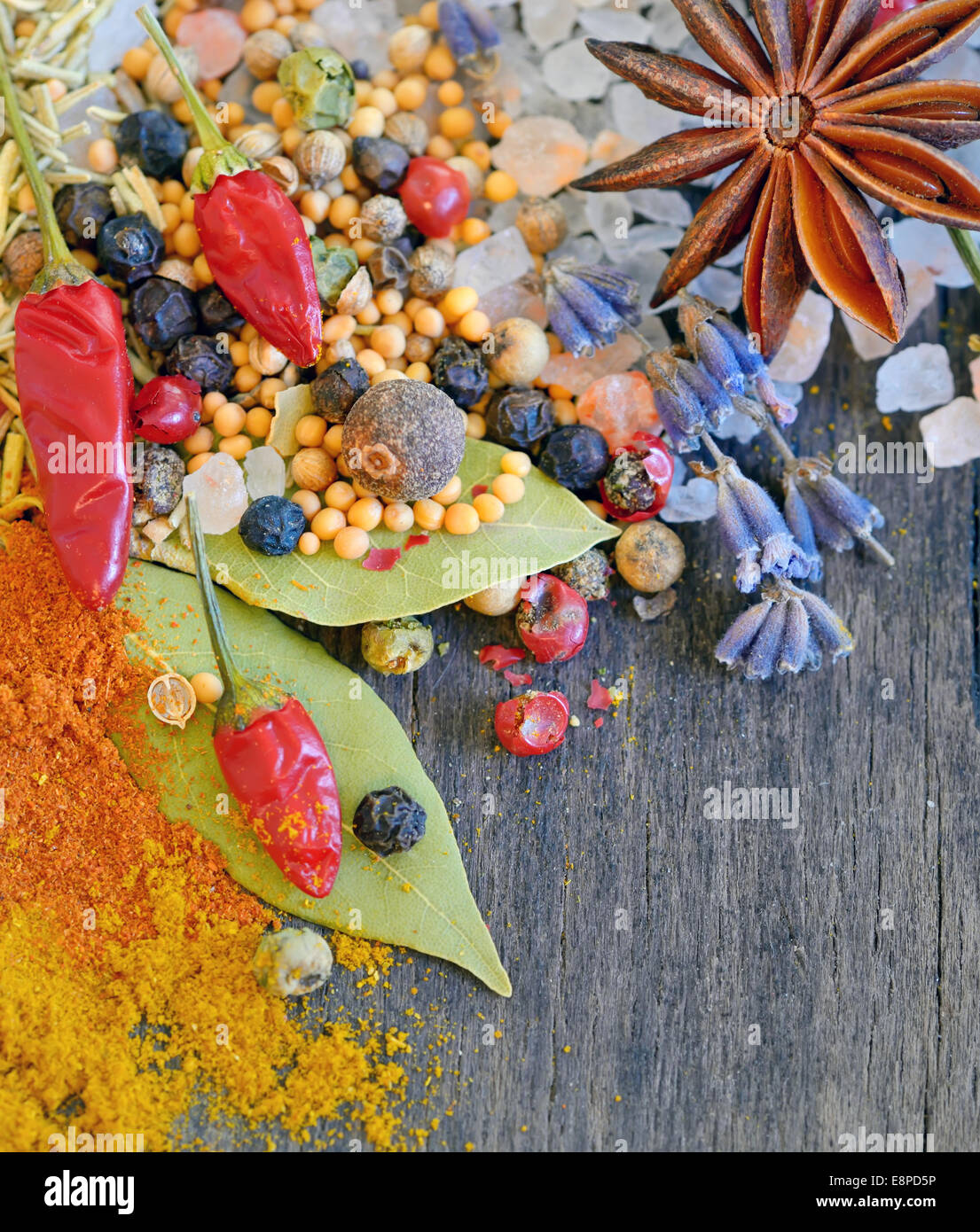 types of spices on old wooden table Stock Photo - Alamy
