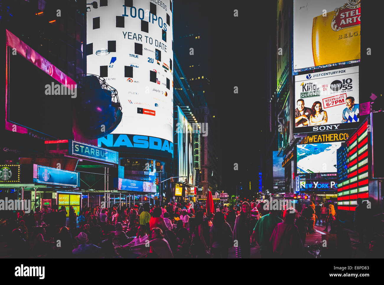 Large crowd of people in Times Square at night, in Midtown Manhattan ...