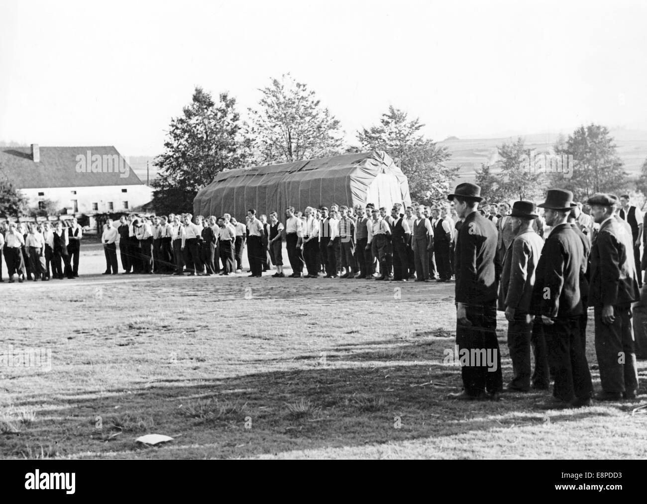 The Nazi propaganda picture shows men lining up for the Sudeten German ...