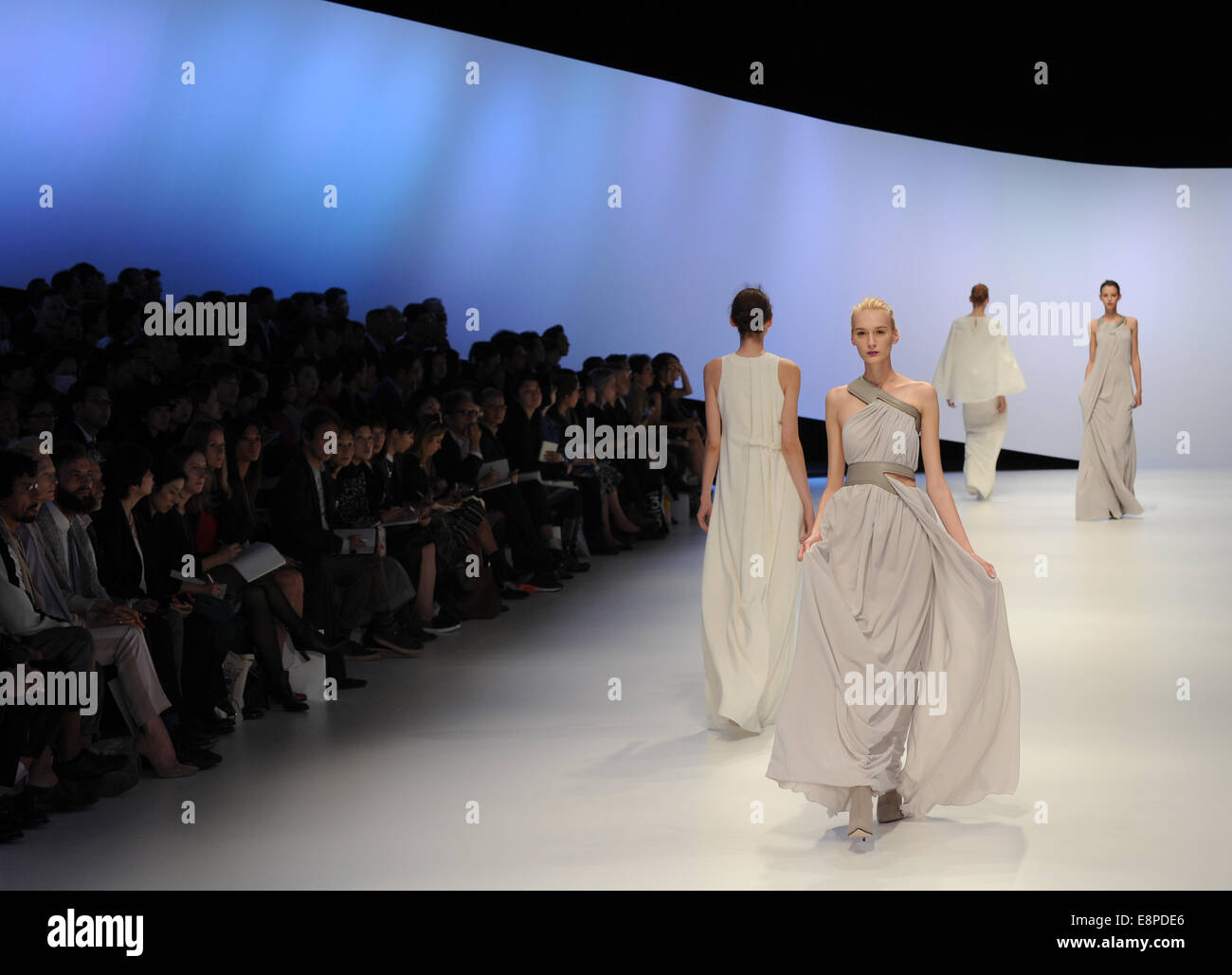 Tokyo, Japan. 13th Oct, 2014. Models display creactions designed by Yu ...