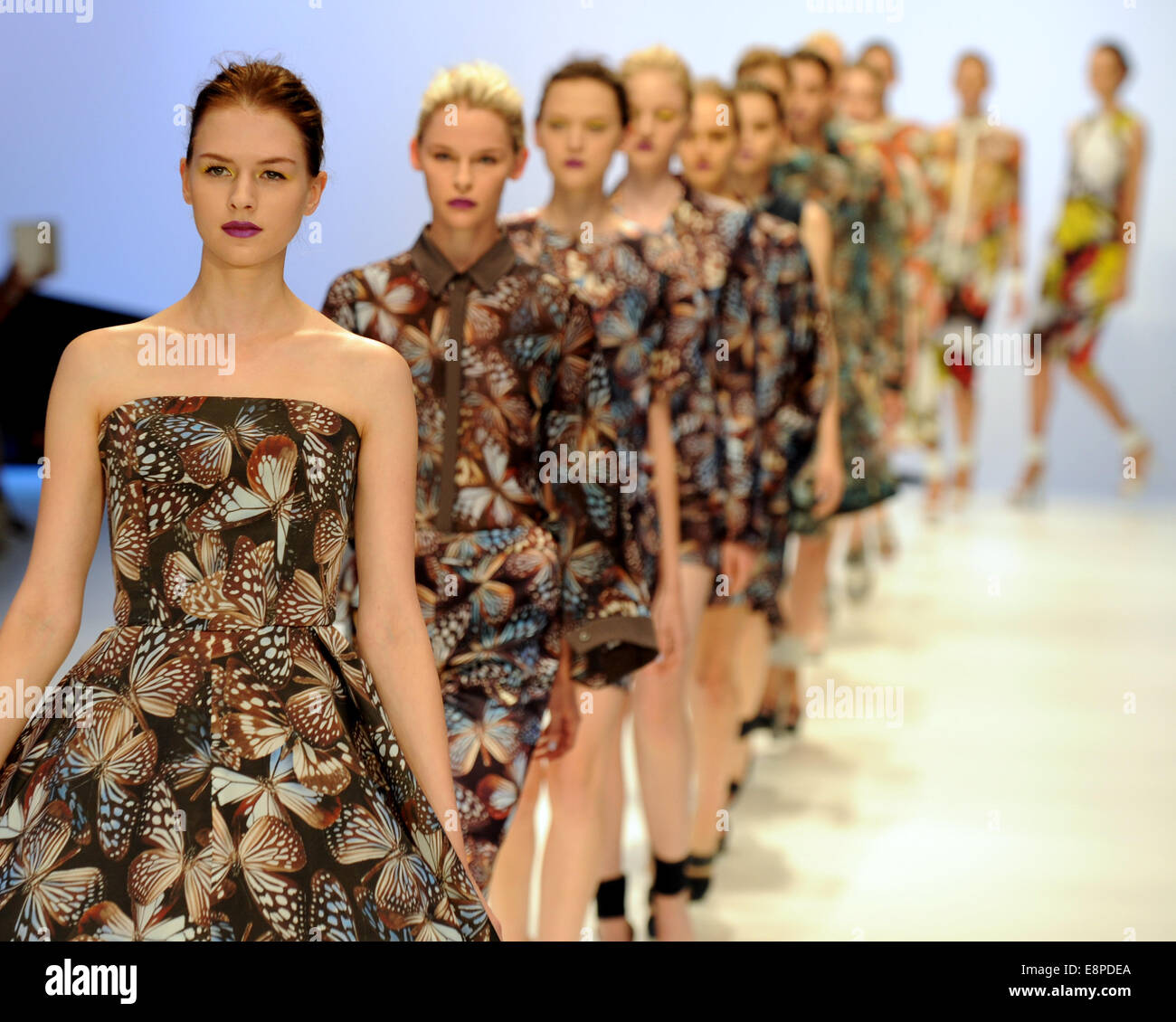 Tokyo, Japan. 13th Oct, 2014. Models display creactions designed by Yu ...