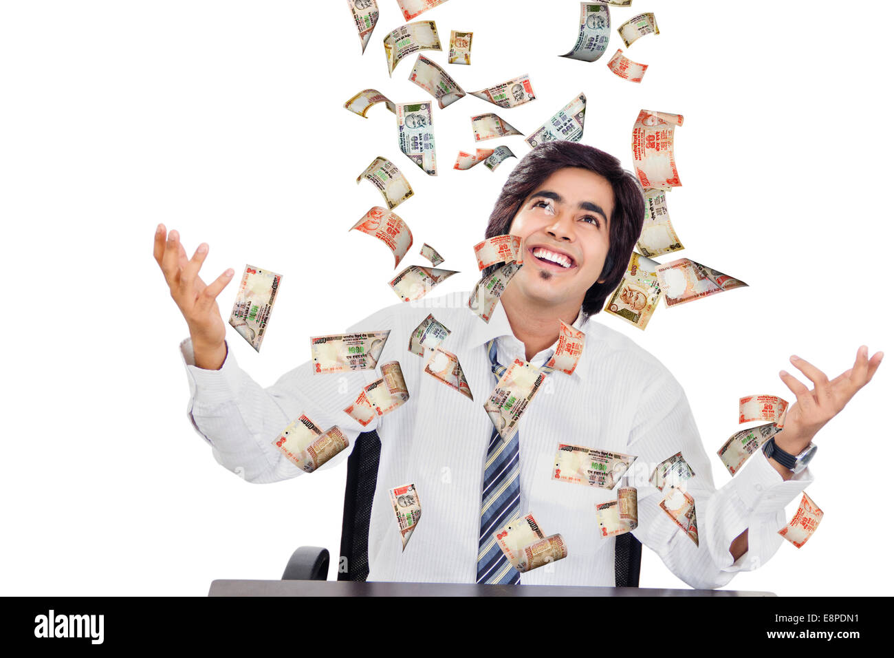 Indian business man falling money hi-res stock photography and images ...
