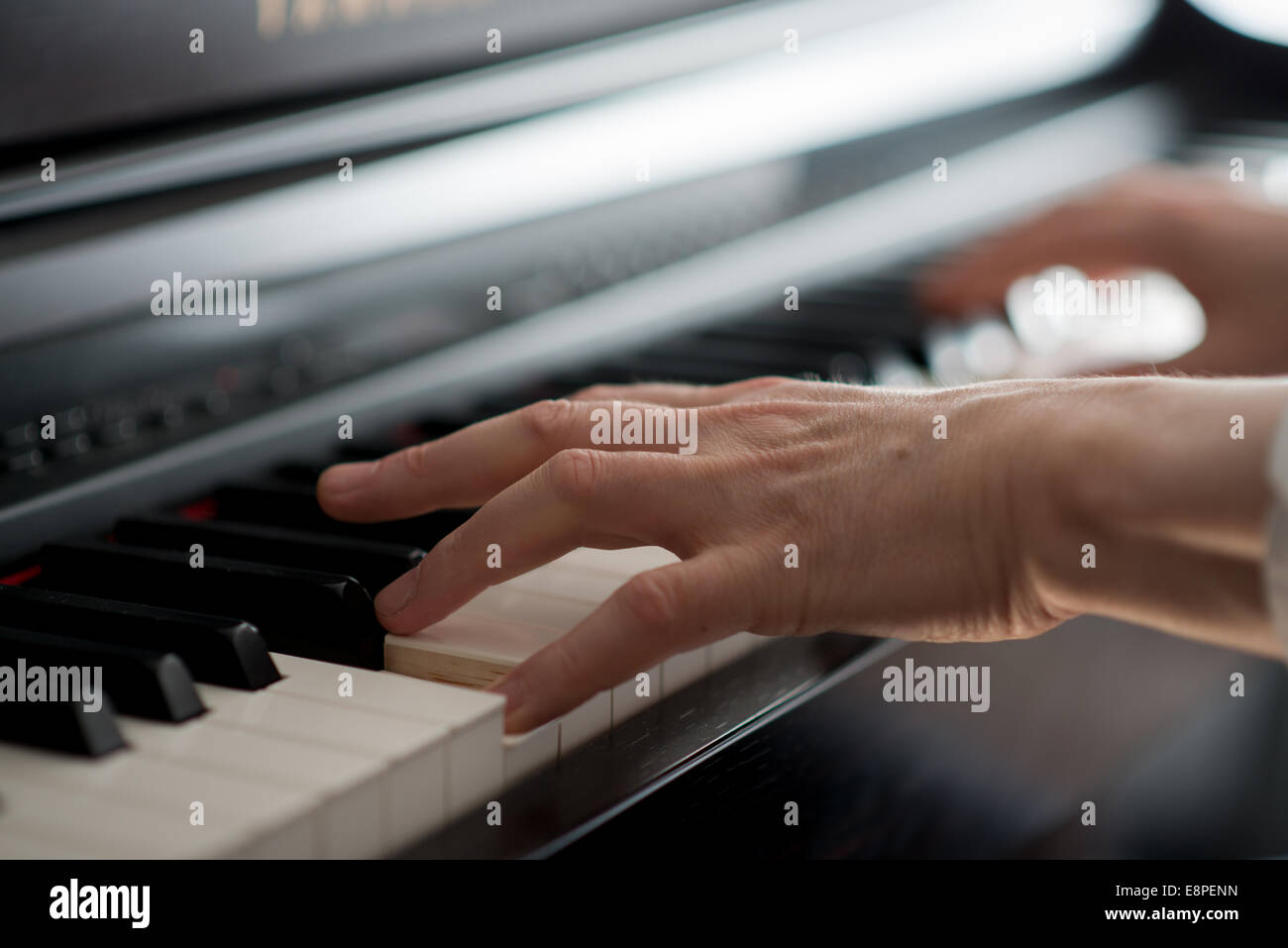 Detail of finger positioning - Playing and learning Piano Stock Photo ...