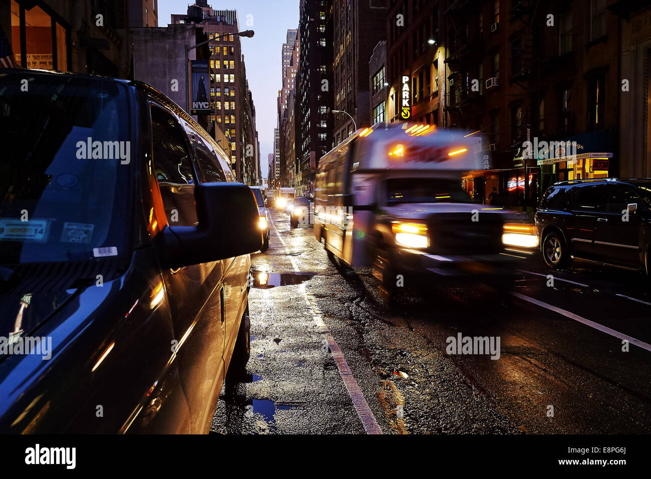 Manhattan cars and traffic at dusk Stock Photo - Alamy