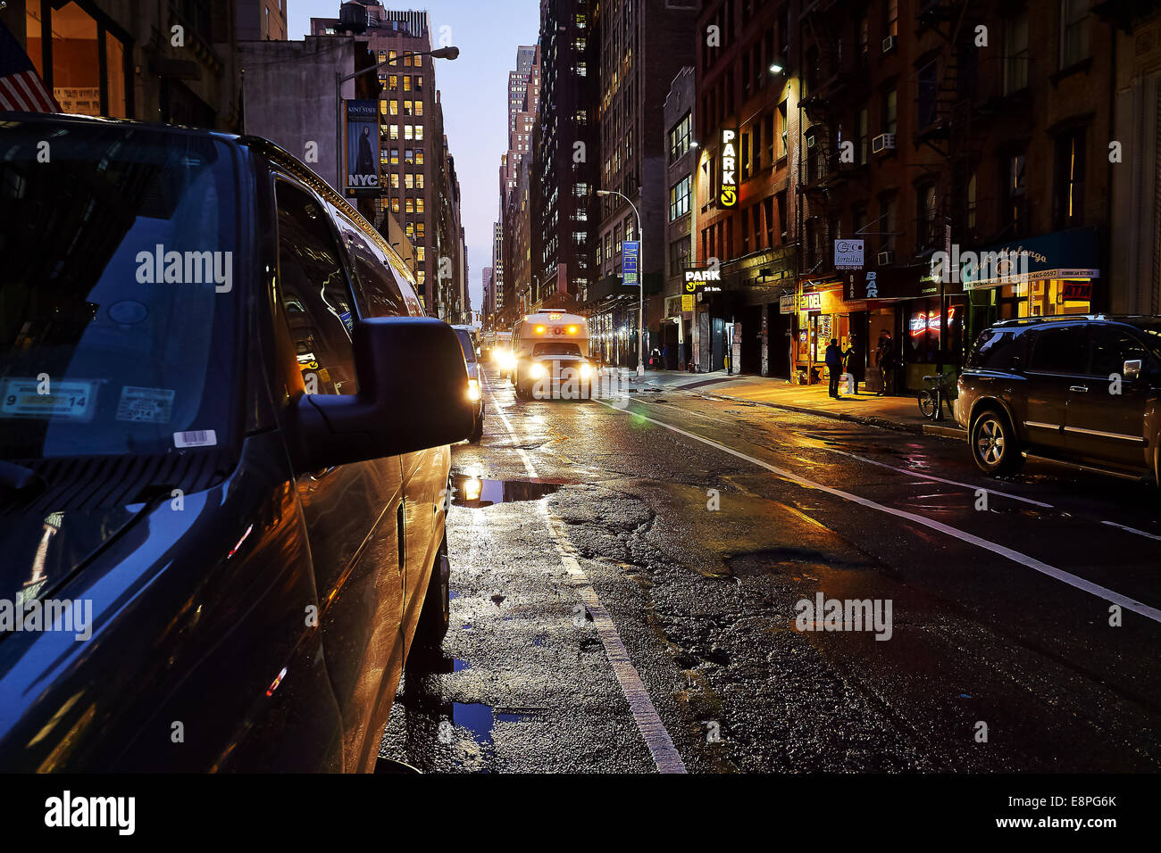 Manhattan cars and traffic at dusk Stock Photo - Alamy