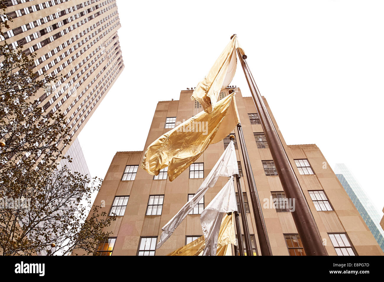 silver and gold flags in new york city Stock Photo - Alamy