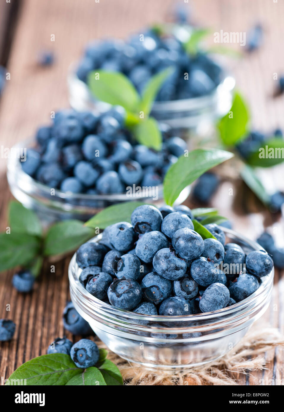 Big portion of fresh harvested Blueberries on wooden background (close ...