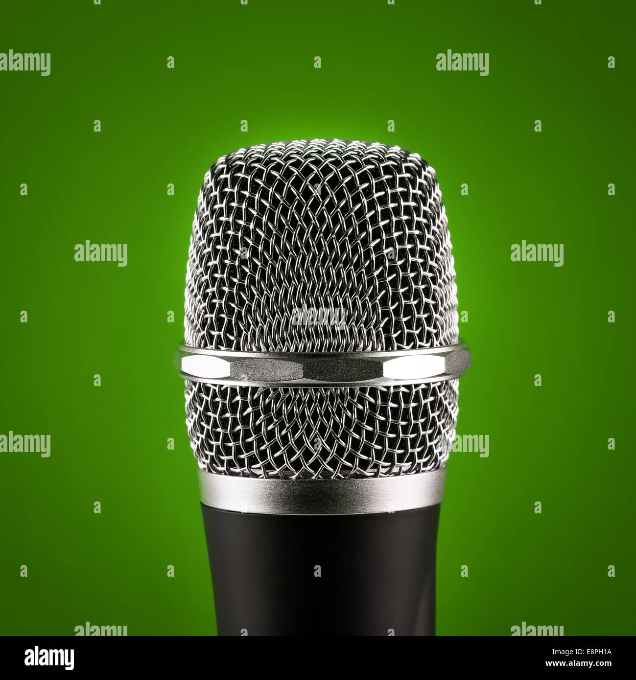 Wireless microphone closeup on green background Stock Photo - Alamy