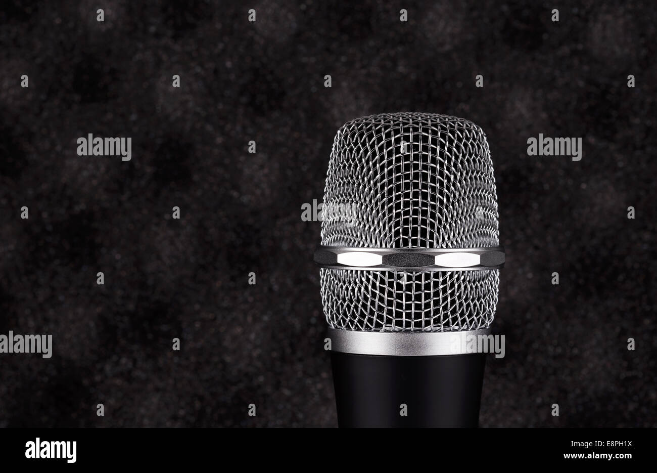 Wireless microphone closeup on foam rubber acoustic treatment ...