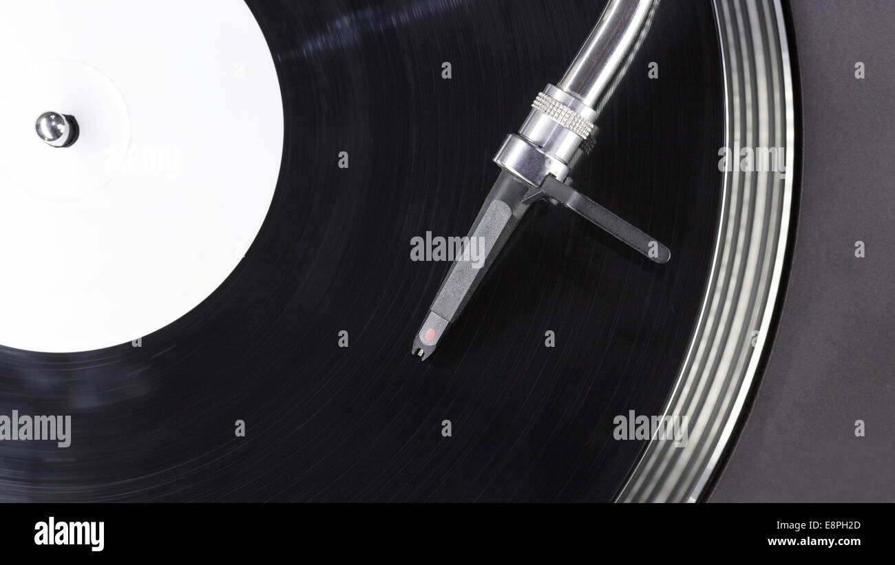 Dj needle stylus on spinning record, closeup Stock Photo - Alamy
