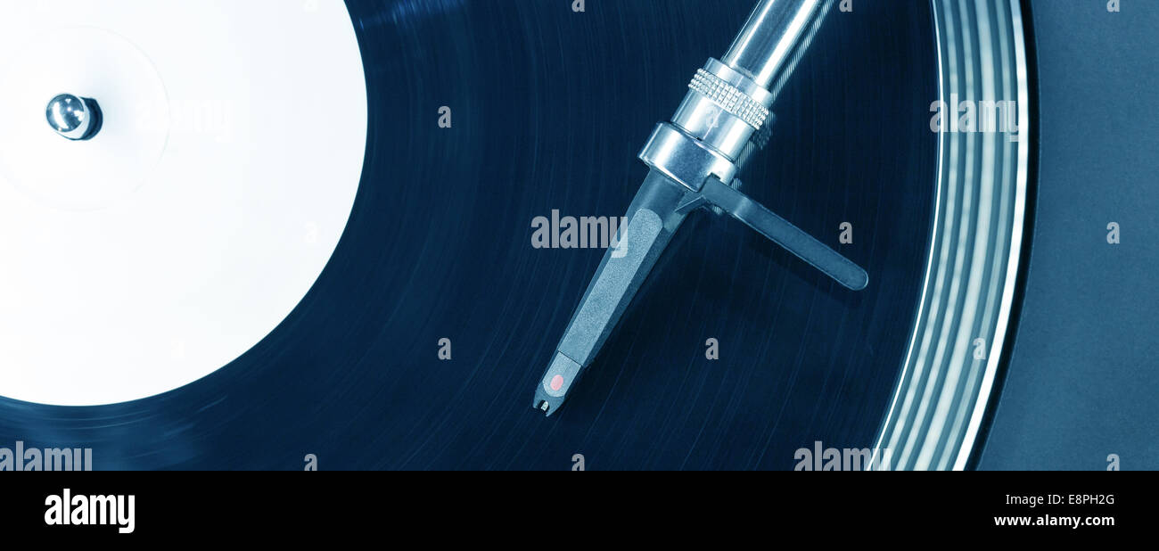 Dj needle stylus on spinning record, closeup Stock Photo - Alamy