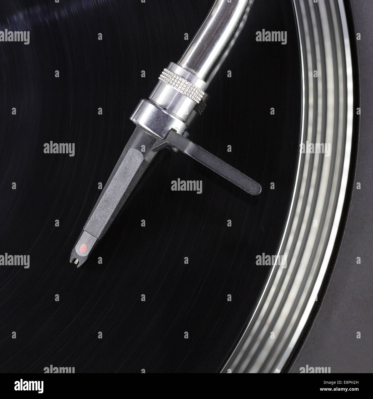 Dj needle stylus on spinning record, closeup Stock Photo - Alamy