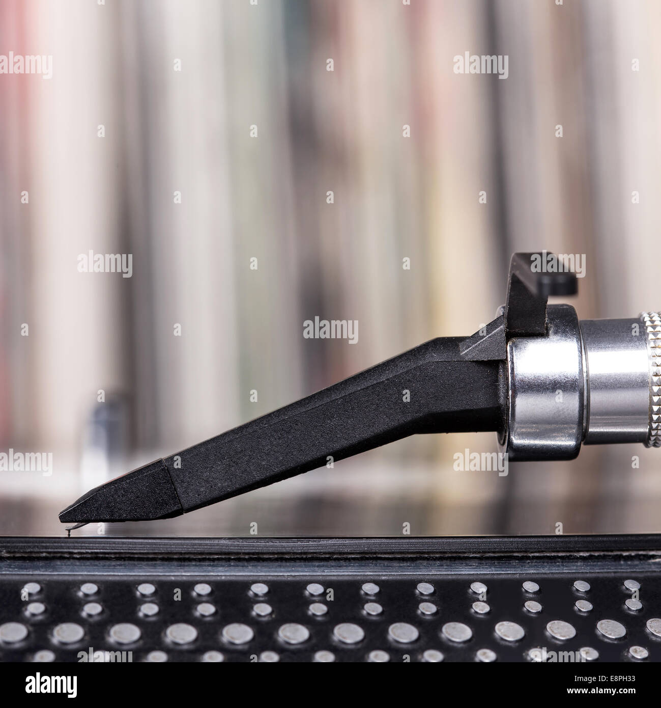 Dj needle stylus on spinning record, vinyl background Stock Photo - Alamy