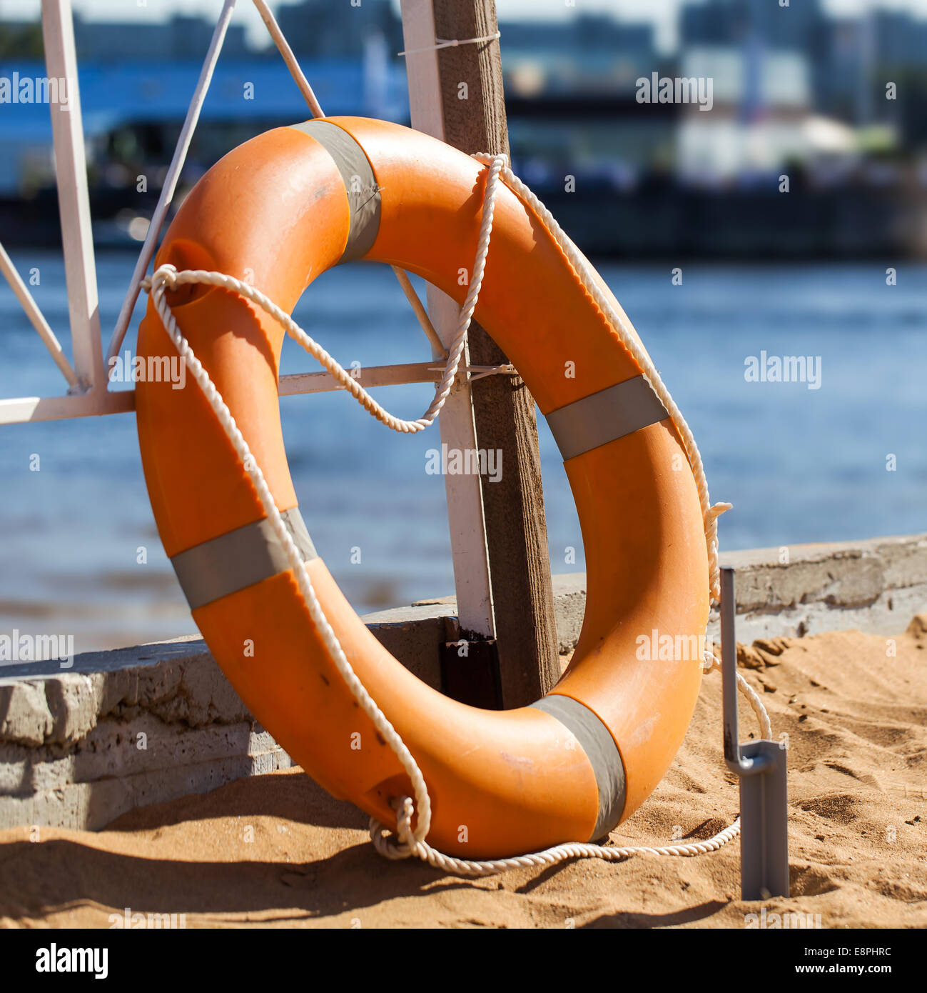 Lifebuoy on beach, closeup Stock Photo - Alamy