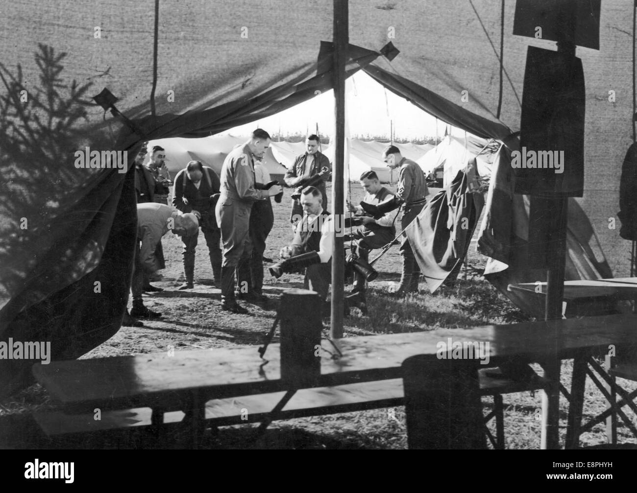 Nuremberg Rally 1938 in Nuremberg, Germany - Polishing boots in the ...