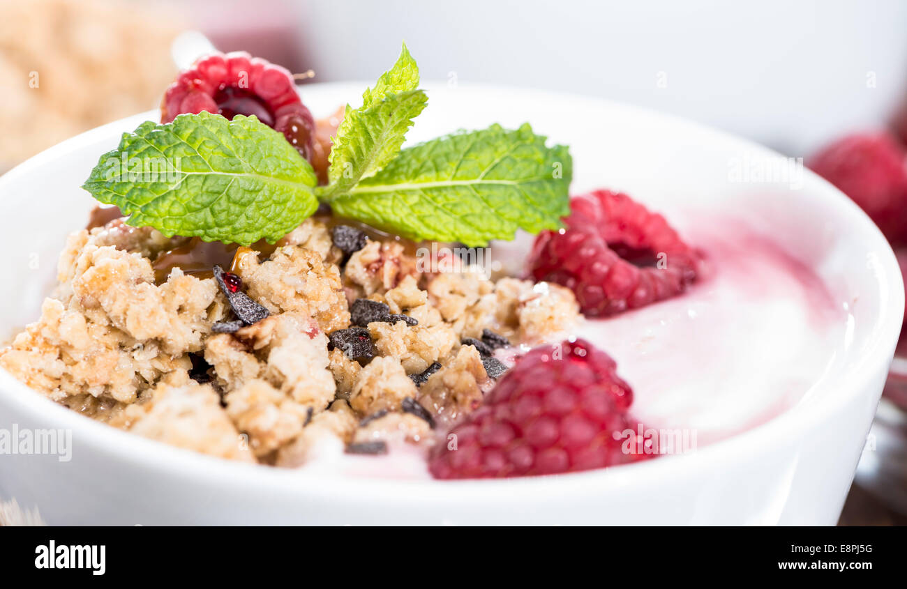 Bowl with fresh made Raspberry Yogurt and some fruits Stock Photo - Alamy