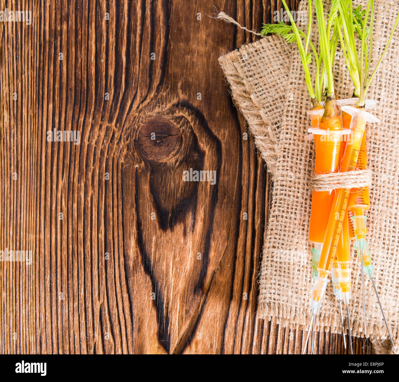 Carrot Juice Injections (on rustic wooden background Stock Photo - Alamy
