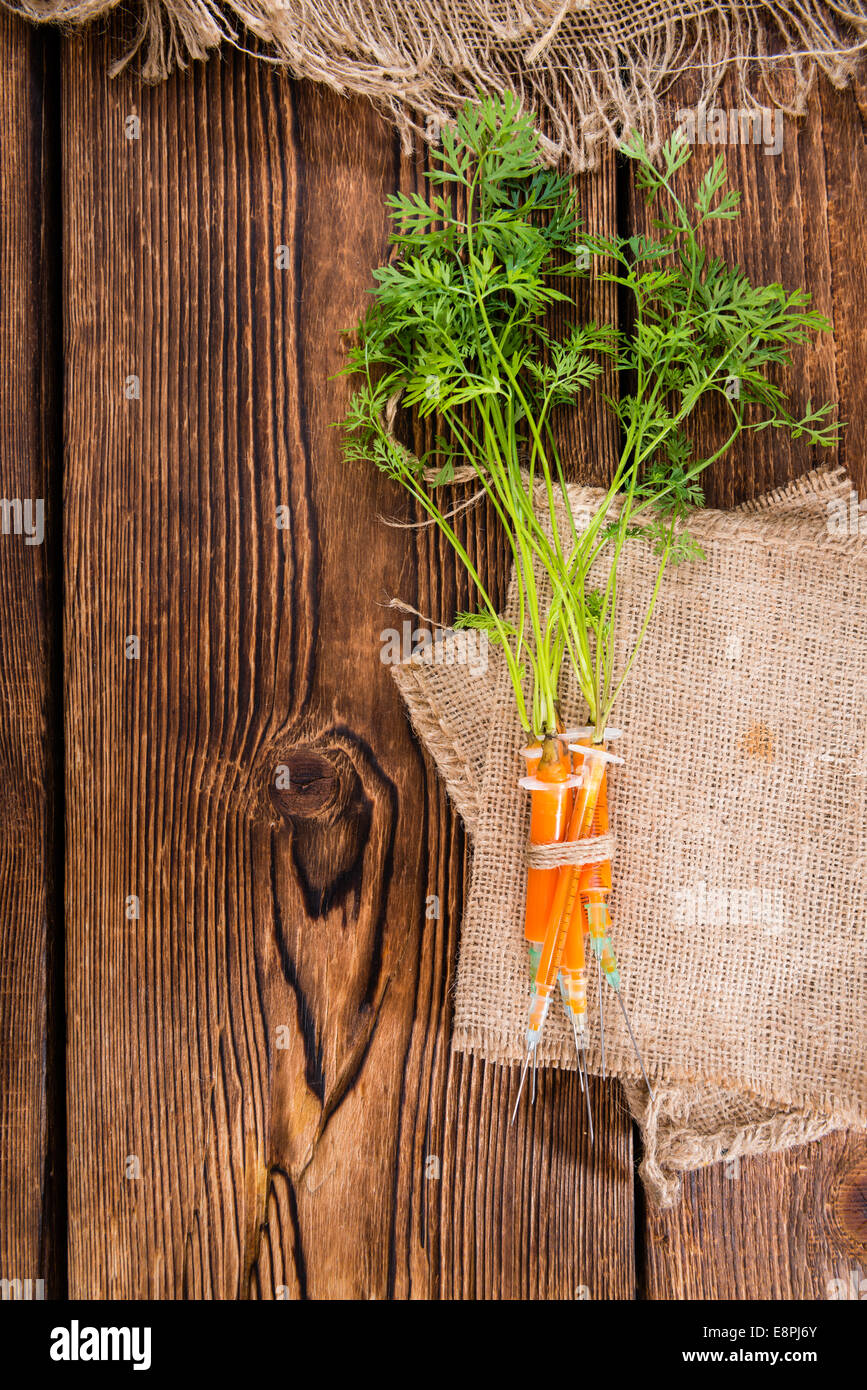 Healthy Vitamin Injection (on rustic wooden background Stock Photo - Alamy