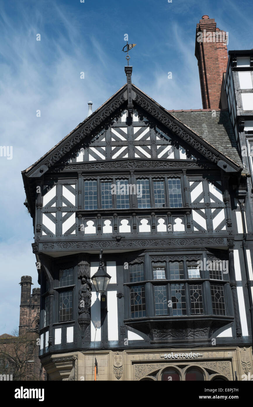 Classic black and white buildings in Chester's Eastgate Street Stock ...