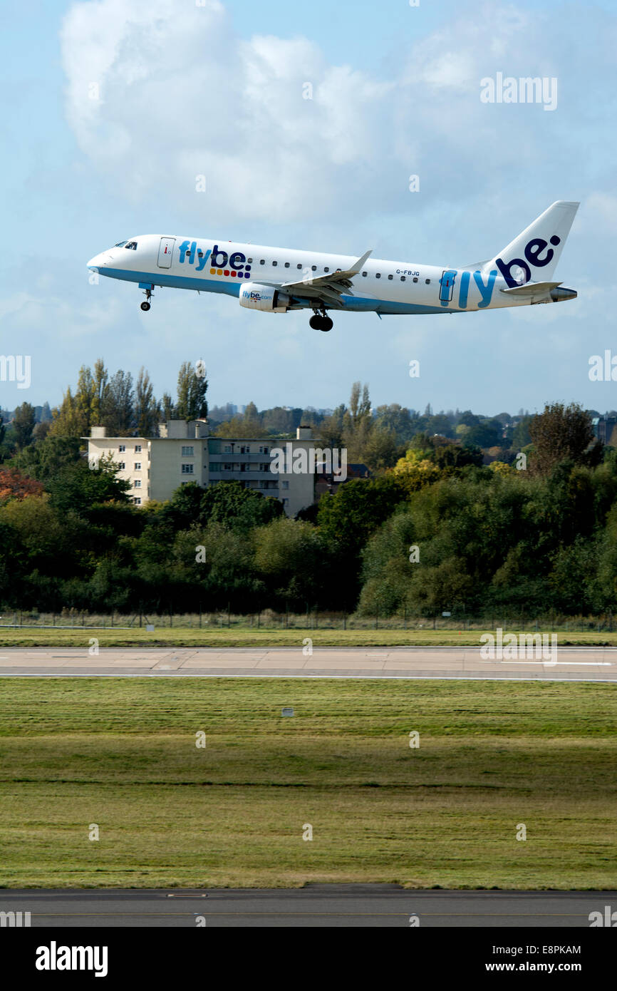 Flybe Embraer ERJ-175 aircraft landing at Birmingham Airport, UK Stock ...