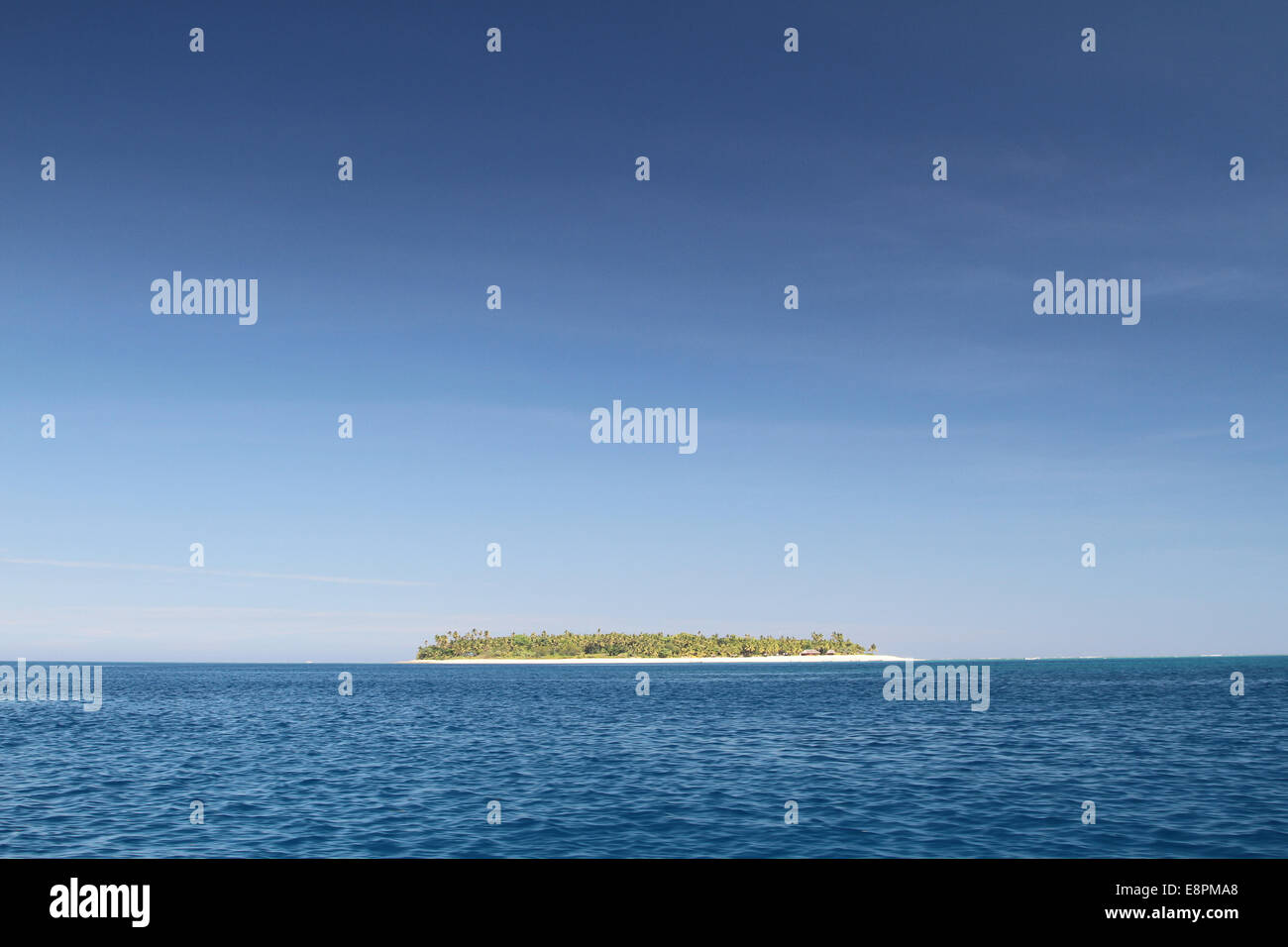 tropical island from a distance Stock Photo - Alamy