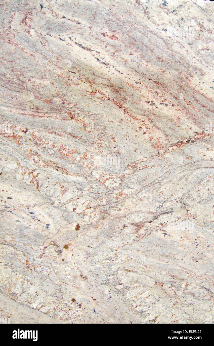 A full slab of cut and polished Granite makes a background of textures ...