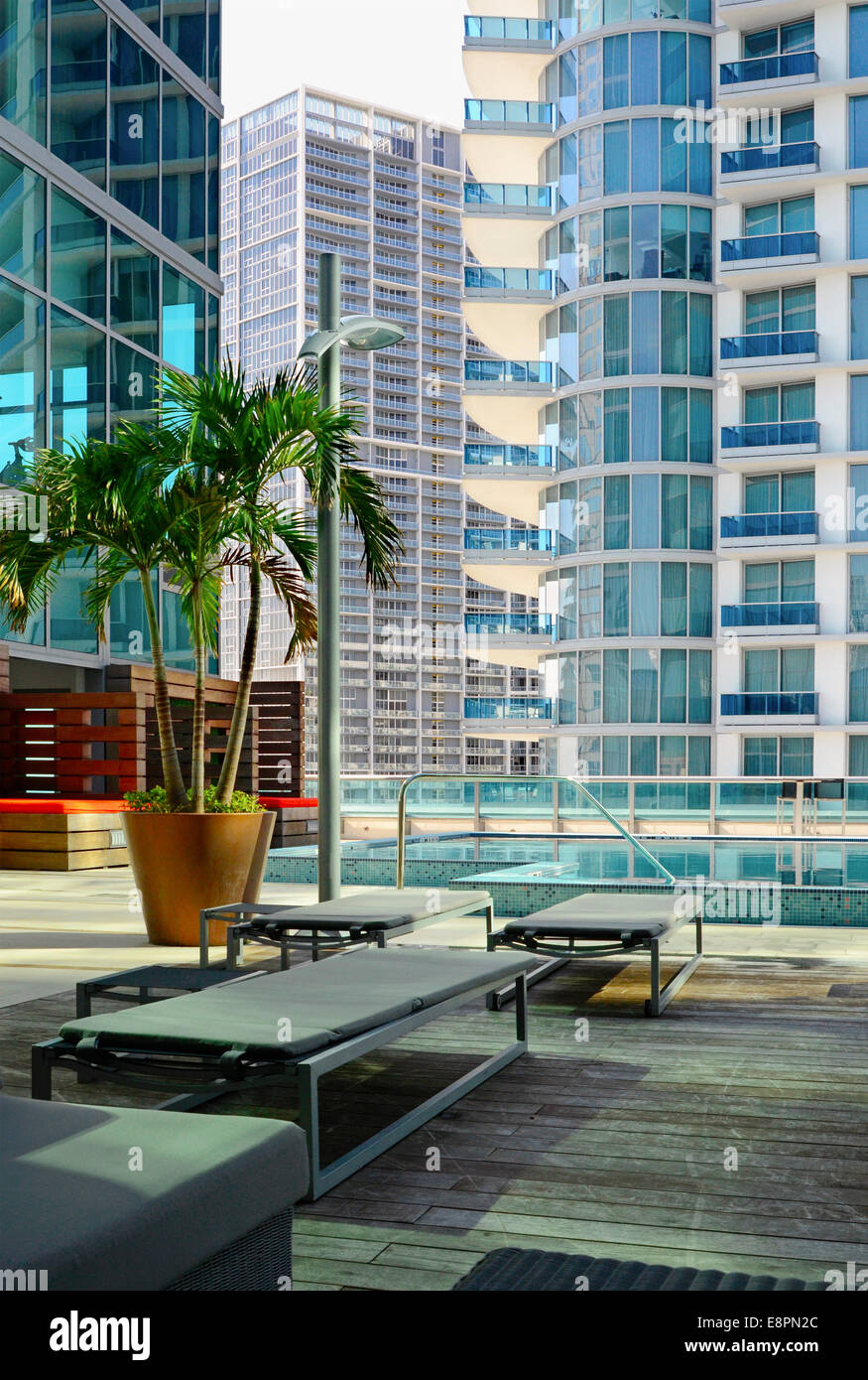 Luxurious condominiums with a roof top swimming pool and garden creates ...