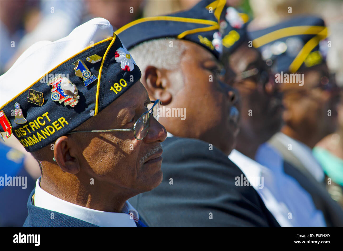 World War II Veterans give their attention during a speech dedicating a ...