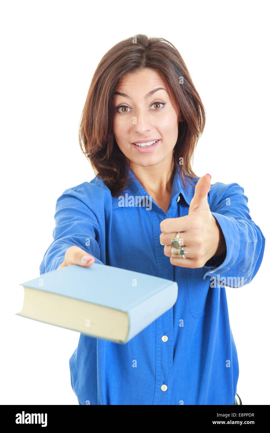 Young pretty woman with book showing thumbs up with concept of great ...