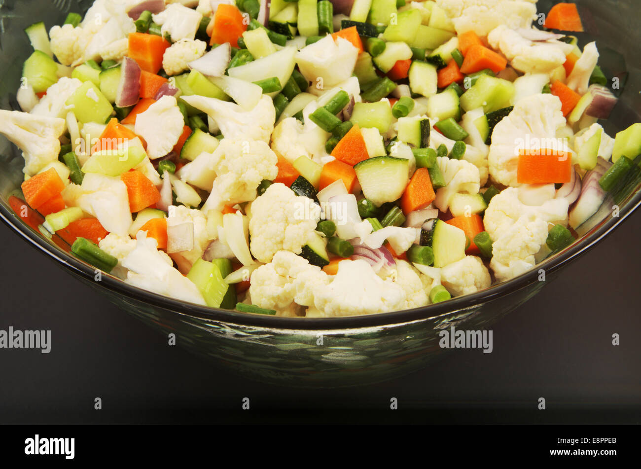 Chopped vegetables for making piccalilli in a glass bowl Stock Photo ...
