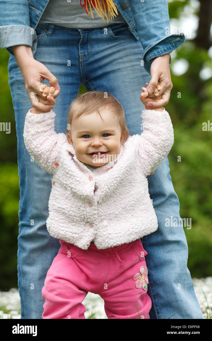 Baby's first steps Stock Photo - Alamy Baby's first steps Stock Photo - Alamy