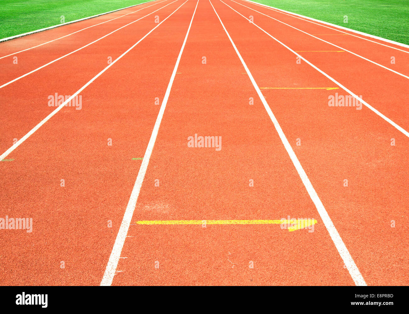 Red outdoor track racetrack pattern abstract background Stock Photo - Alamy