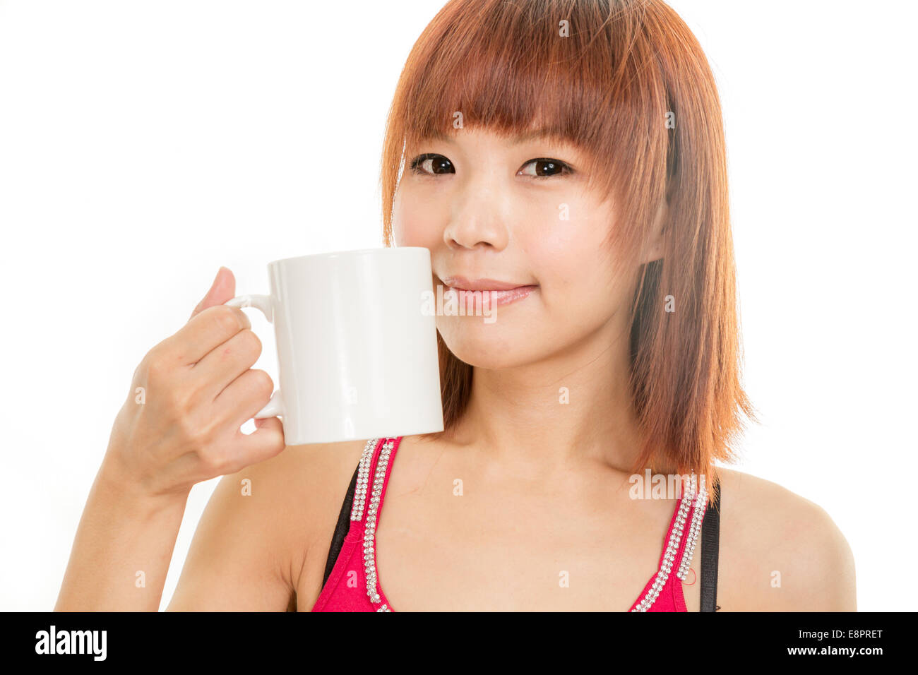 Chinese female in red dress with coffee mug Stock Photo - Alamy