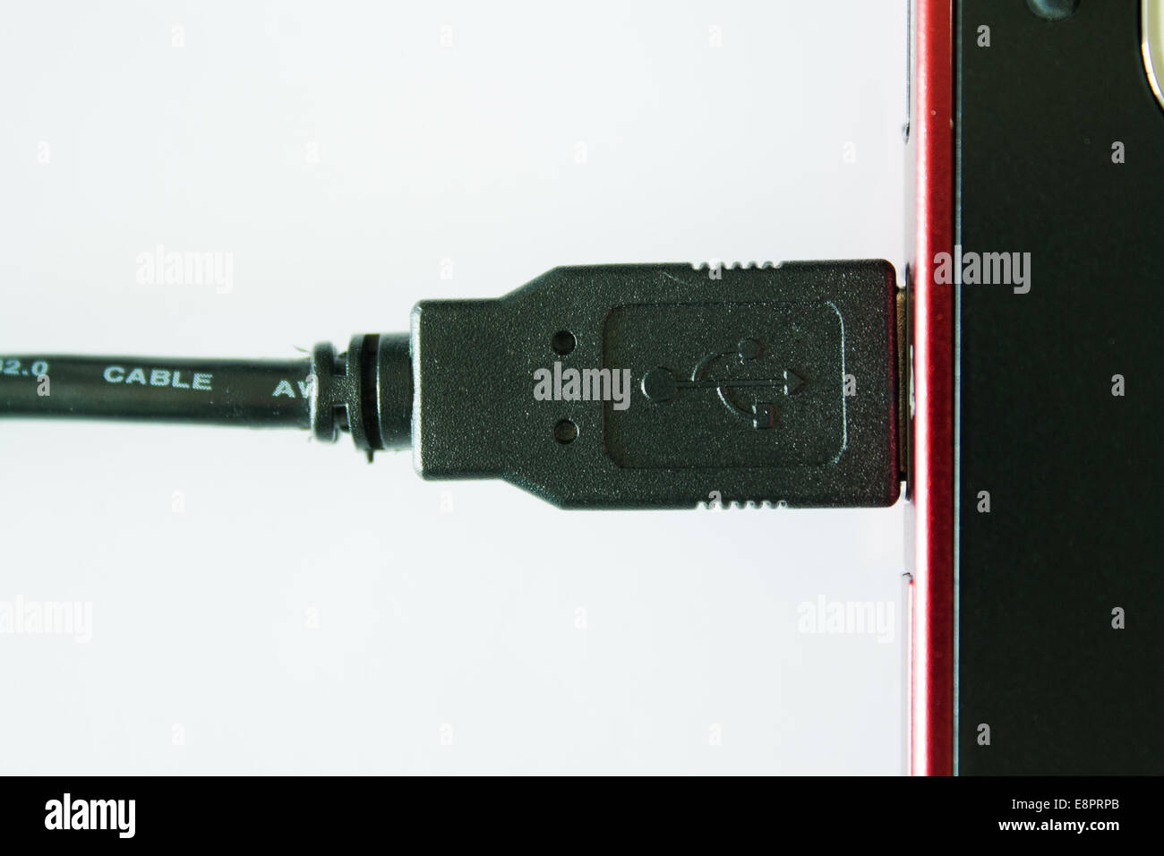 USB Cable connected in a black laptop - on white background Stock Photo ...