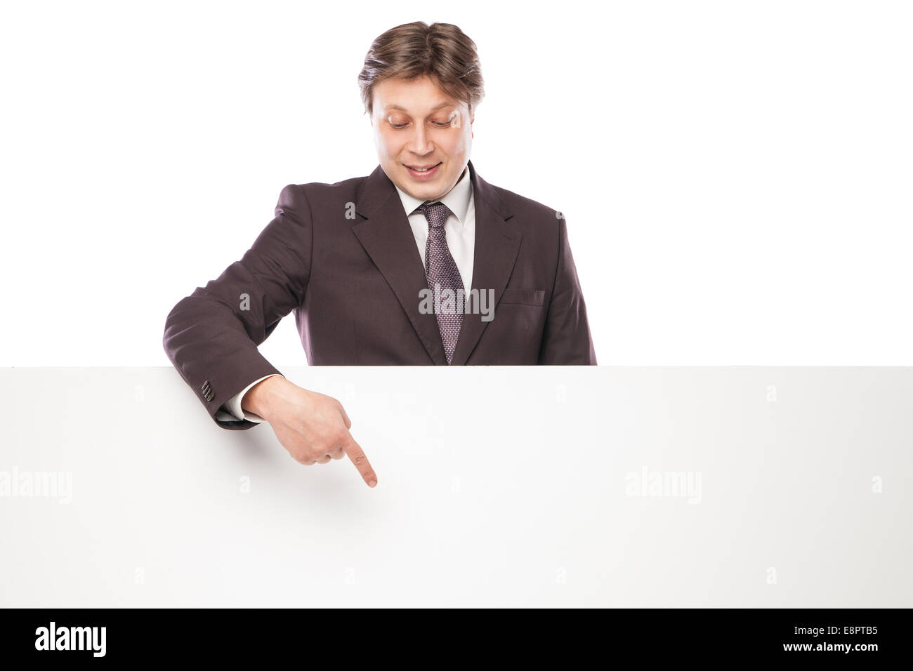 Business man holding empty board and pointing Stock Photo - Alamy